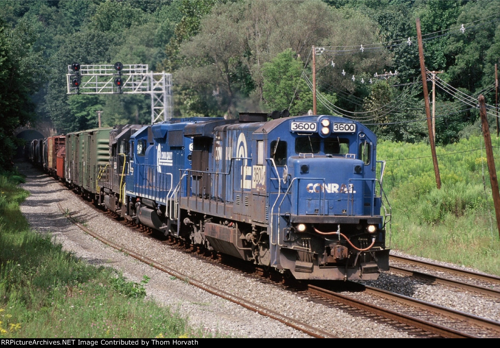 NS 3600, ex-CR 5000, is the leader for local NS H74 heads east @ MP 64